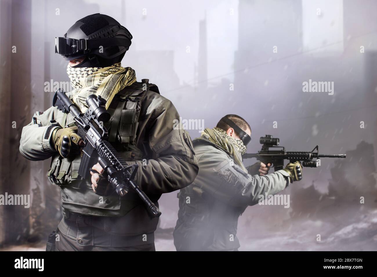 Soldiers in military outfit posing on destroyed city battlefield ...