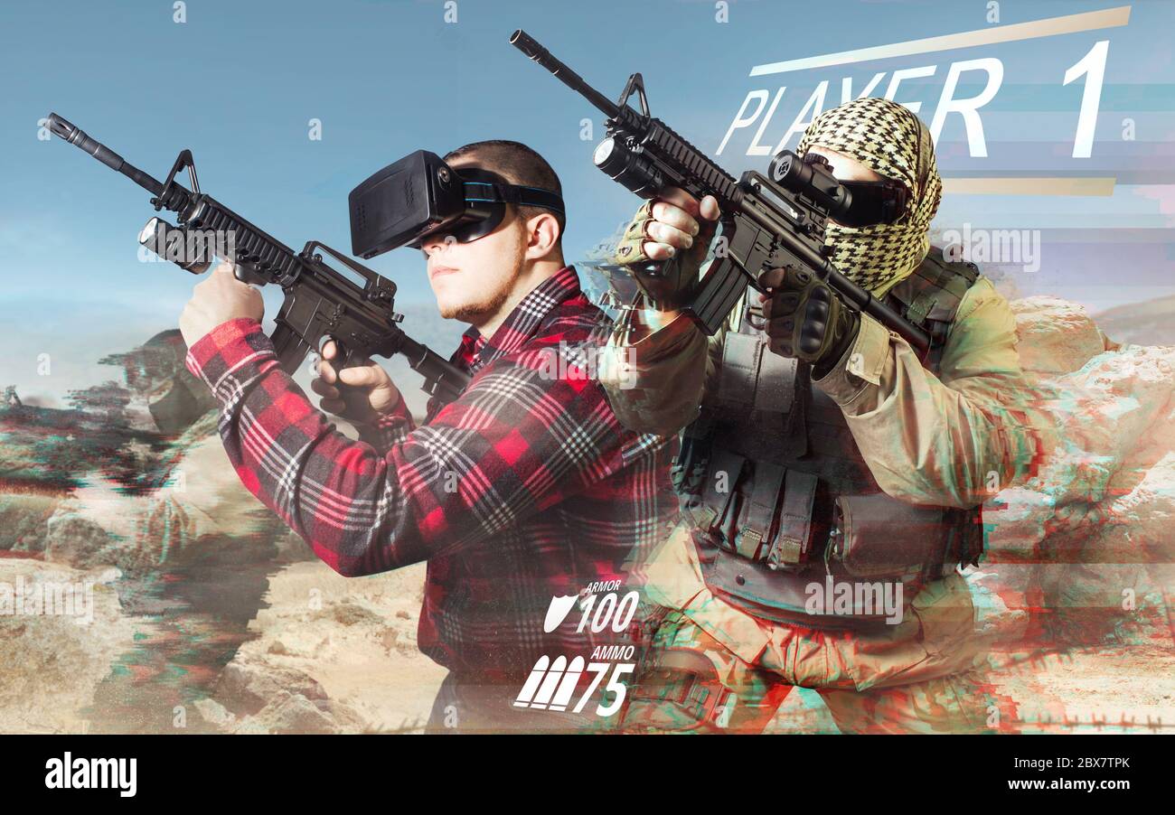 Vr gamer playing war game and aiming automatic rifle with fully ...