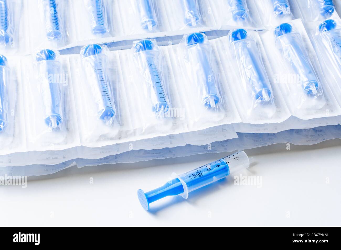 Set of blue syringes for blood samples Stock Photo - Alamy