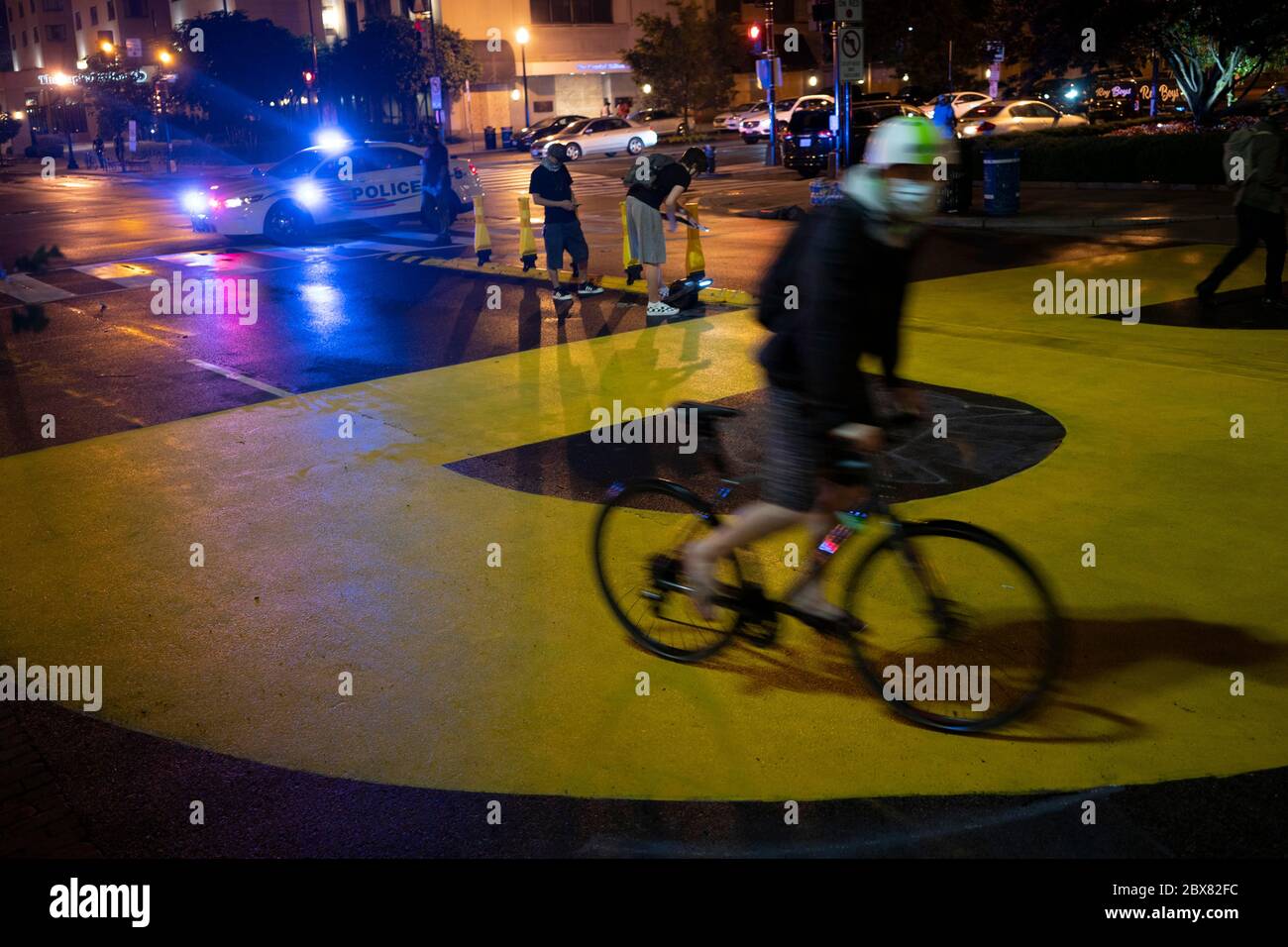 Police car rides near vehicle hi-res stock photography and images - Alamy
