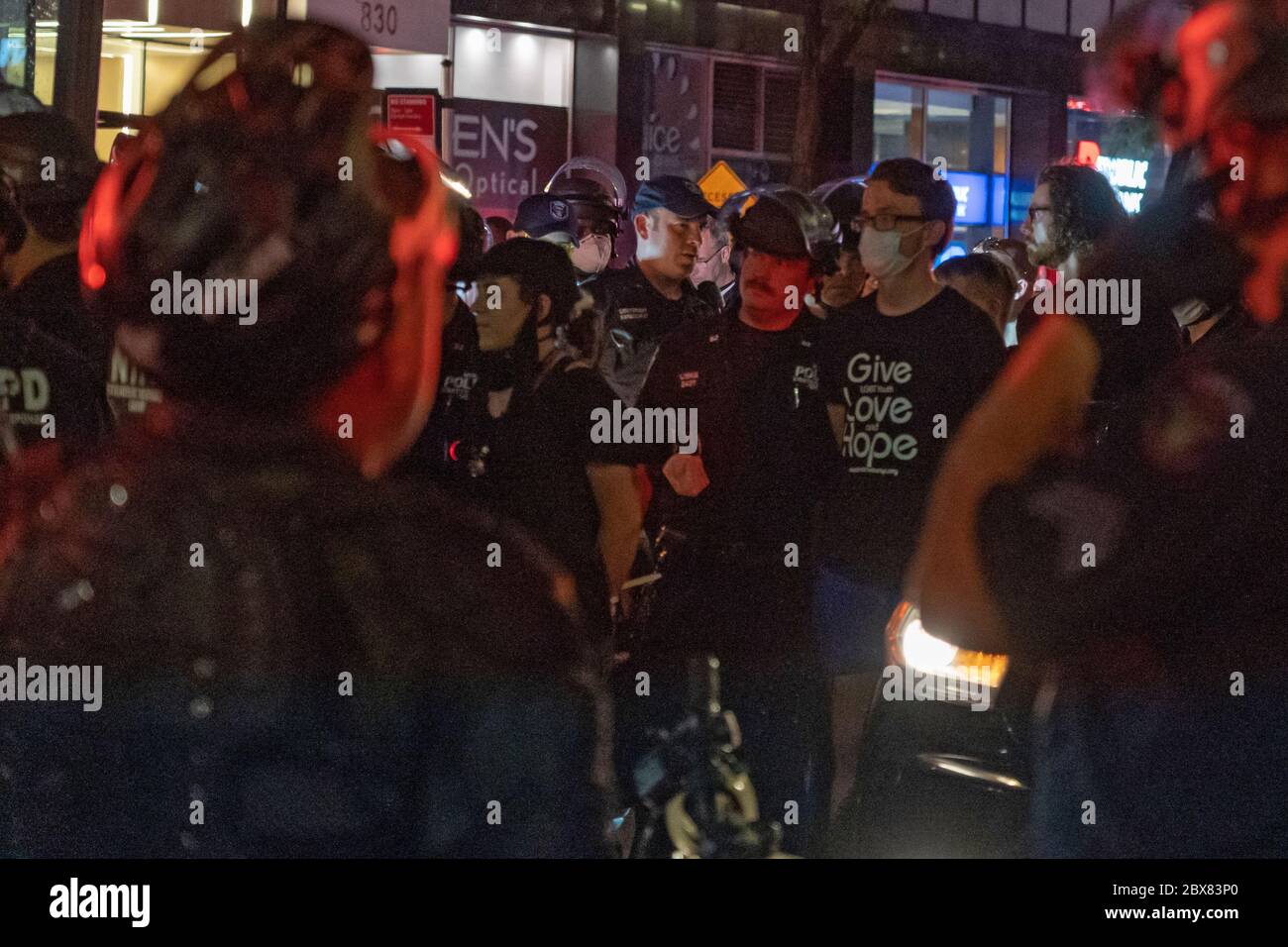 NEW YORK, NY - JUNE 03: Protesters in handcuff are lined up and process ...