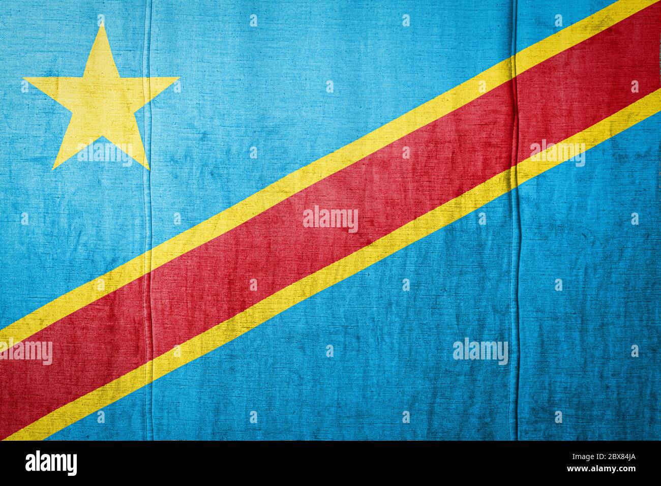 National flag of Democratic Republic of the Congo depicting in paint ...