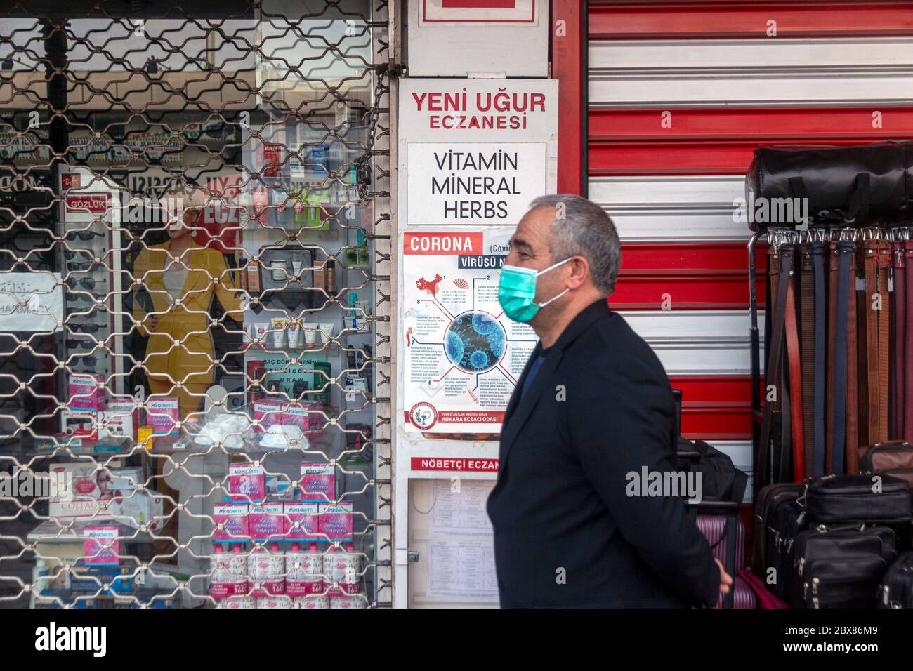 Man wears face mask walks hi-res stock photography and images - Alamy