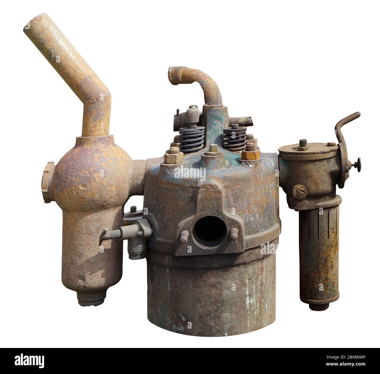 The exhaust pipes of an old rusty vintage tractor looks like a space ...