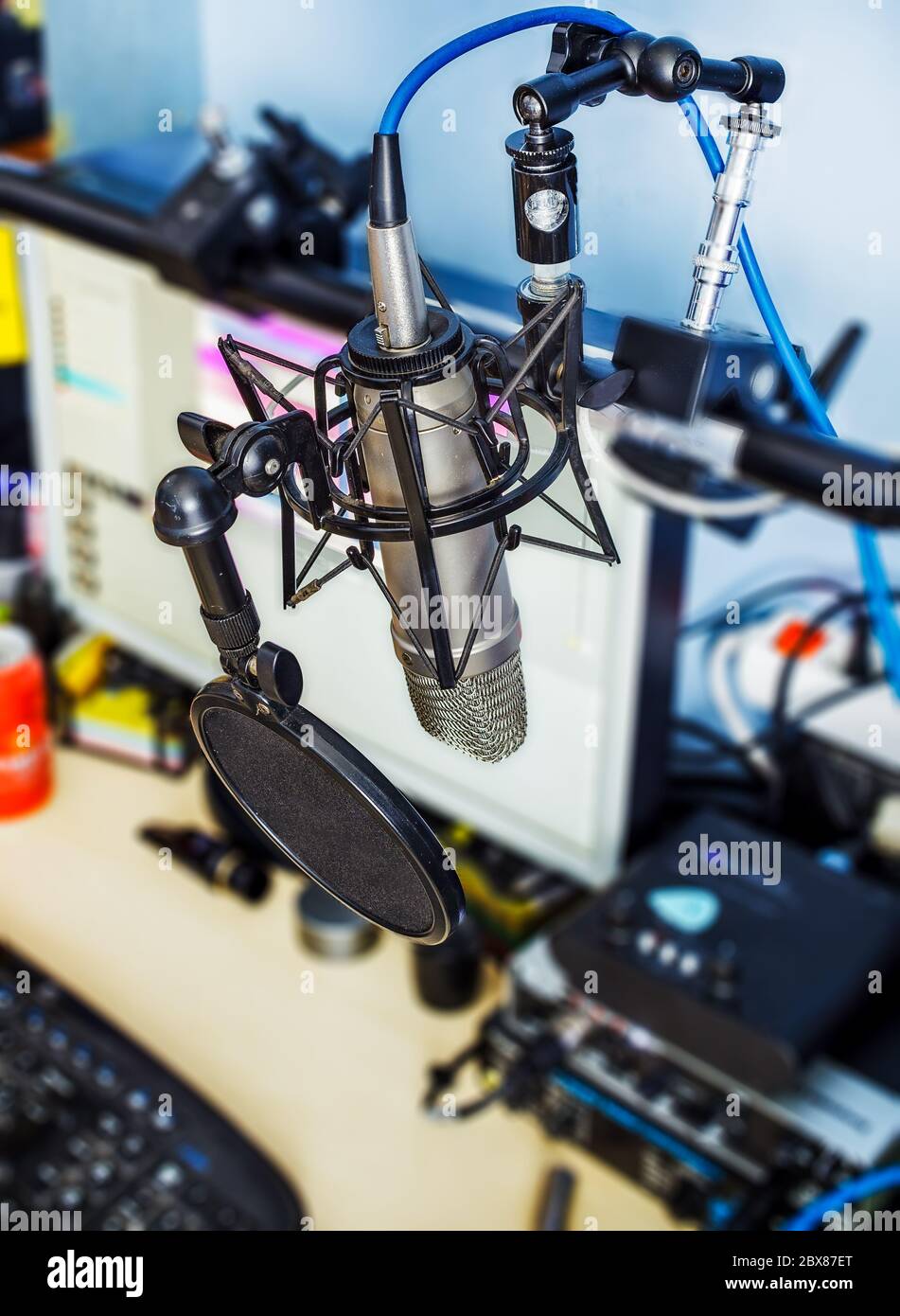 condenser microphone on a desk table stand - studio microphone ...