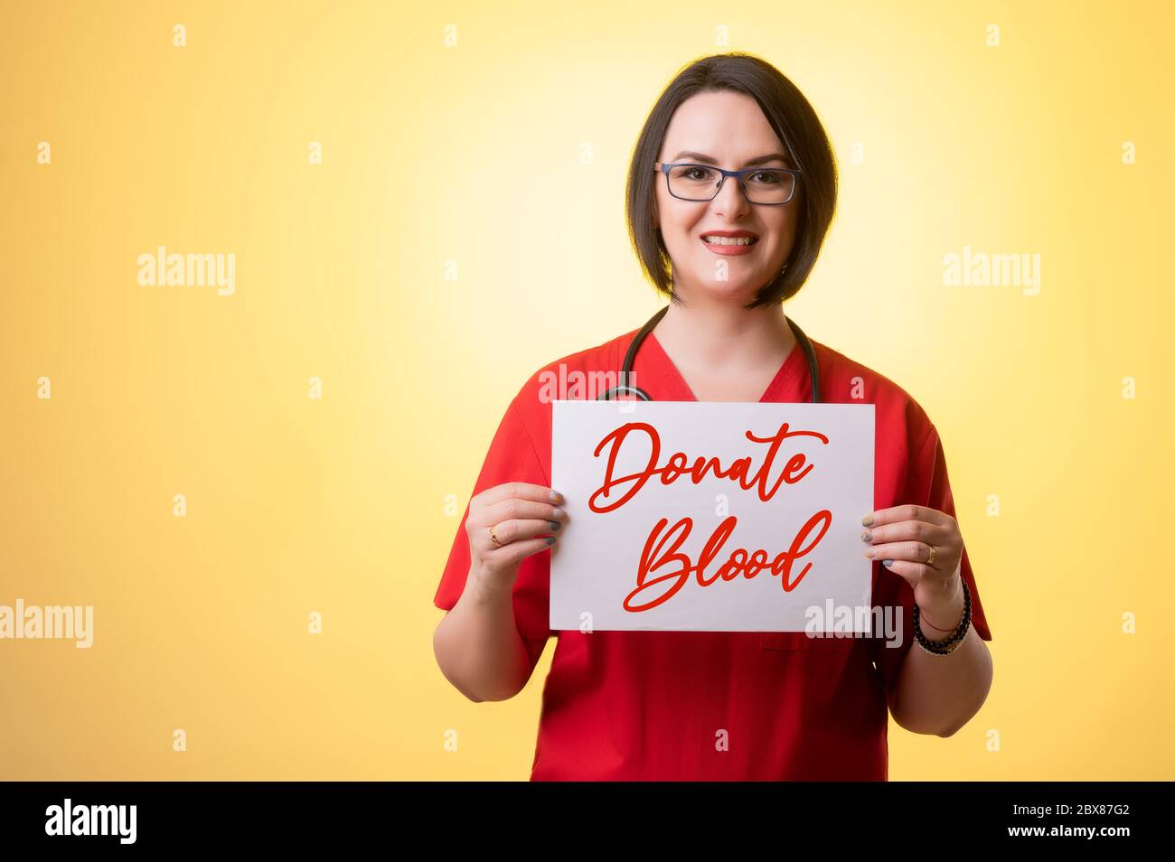 Doctor scrubs blood hi-res stock photography and images - Alamy