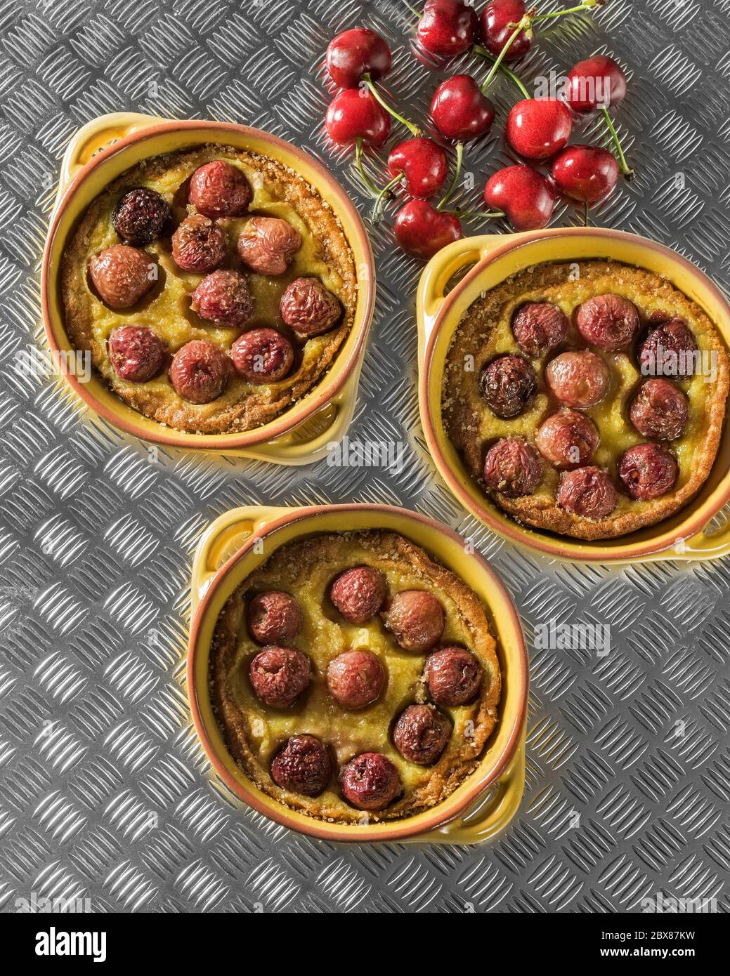 Individual cherry clafoutis. Fruit dessert Stock Photo - Alamy