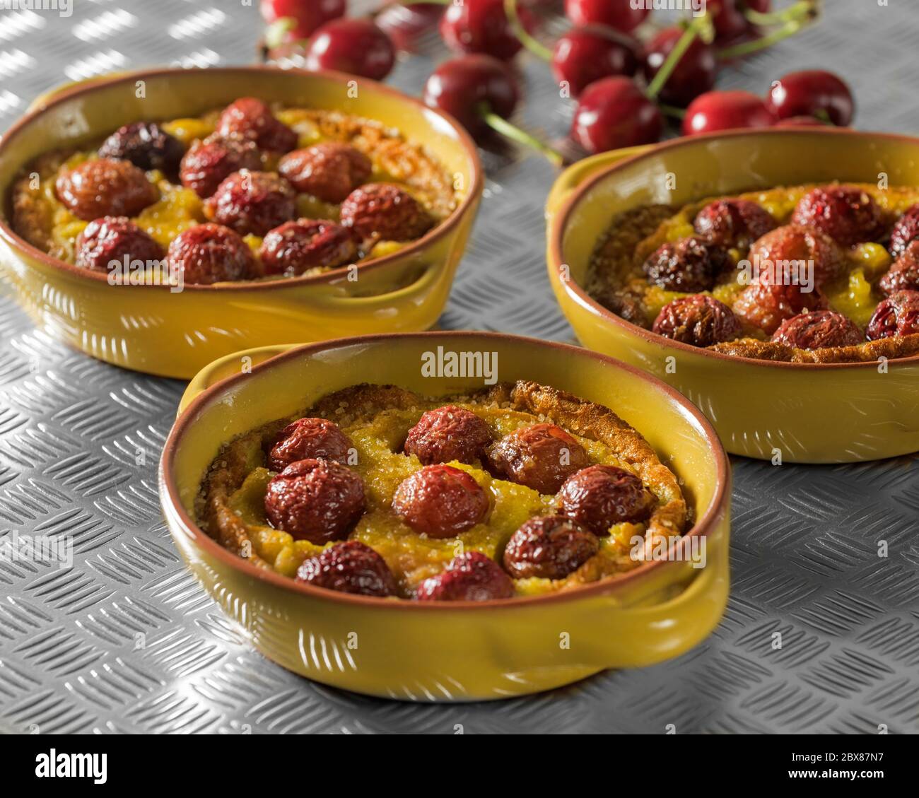 Individual cherry clafoutis. Fruit dessert Stock Photo - Alamy