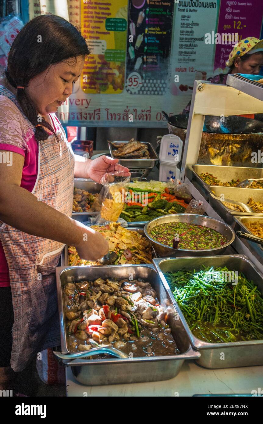 Female cook preparing Thai food in Bangkok, Thailand Stock Photo - Alamy