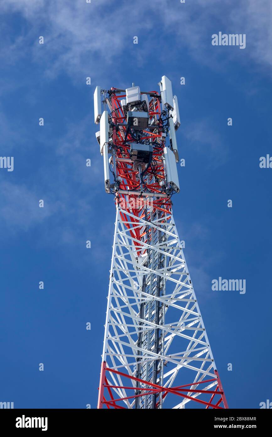 Top of a metallic red and white self supporting cellular network ...