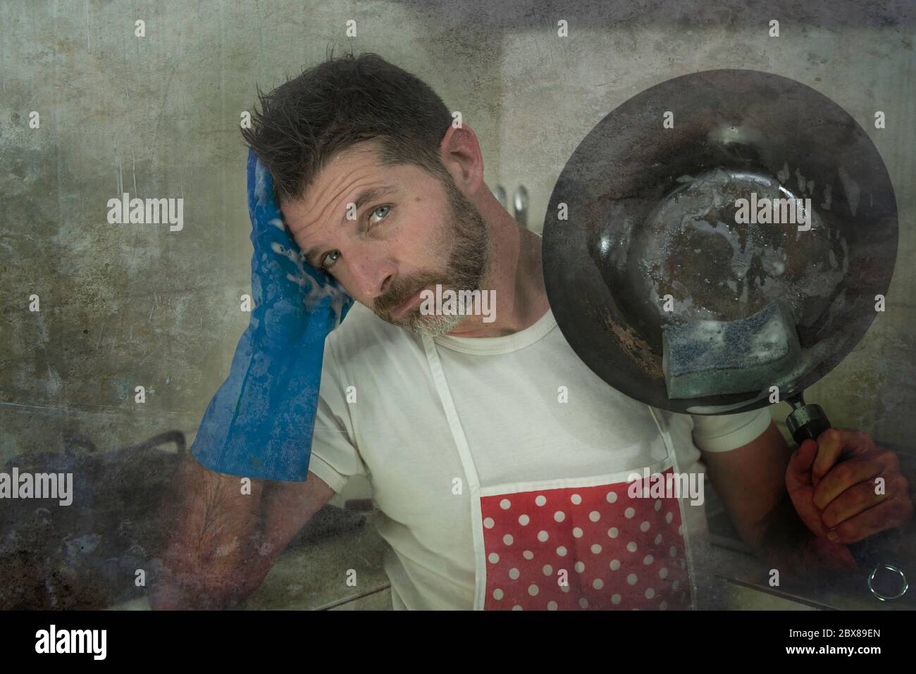 domestic chores stress - lifestyle portrait of young attractive ...