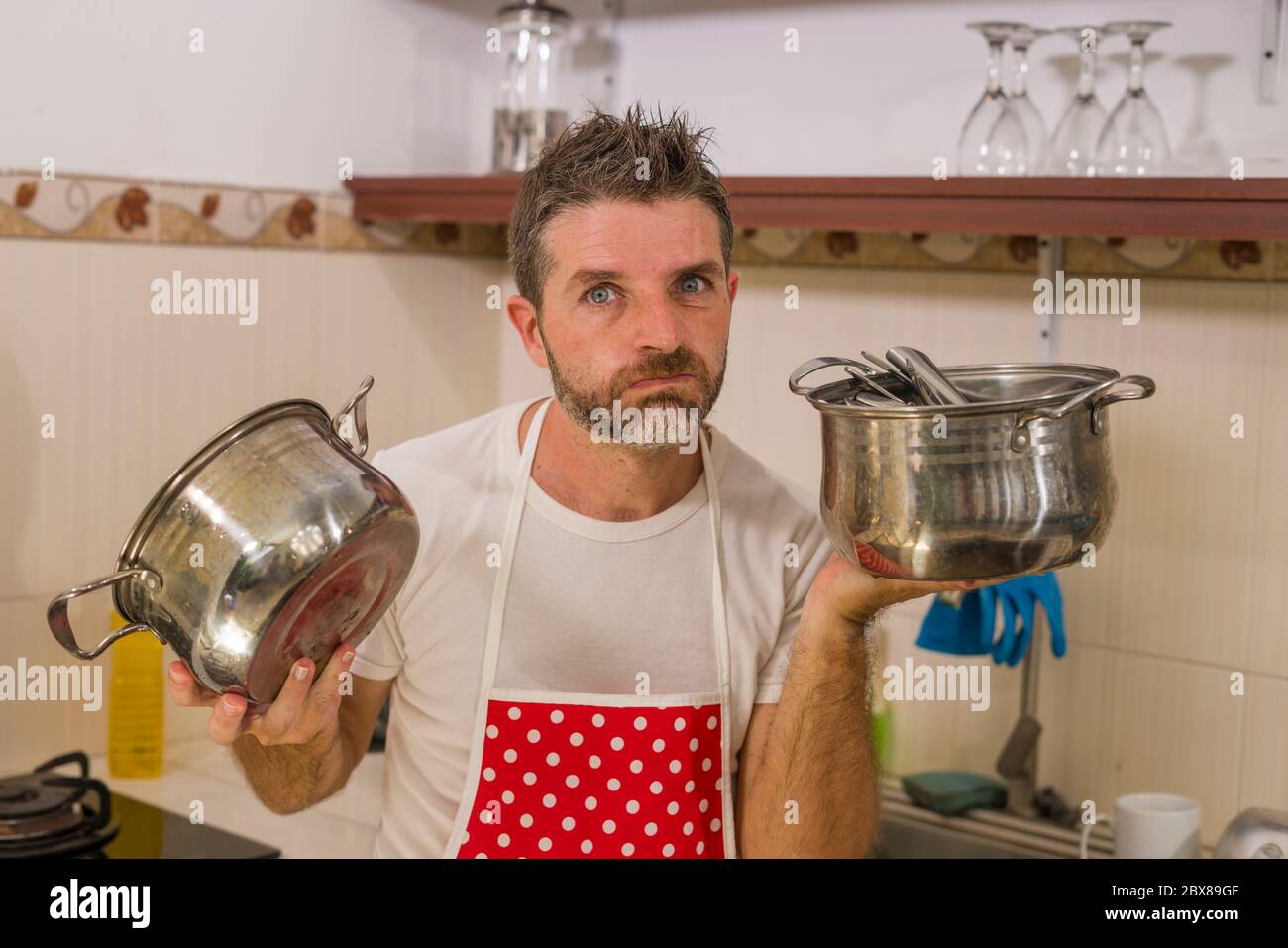 domestic chores stress - lifestyle portrait of young attractive ...