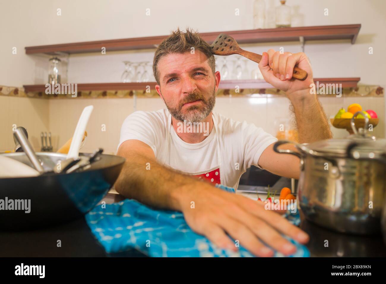 Exhausted chef in kitchen hi-res stock photography and images - Alamy