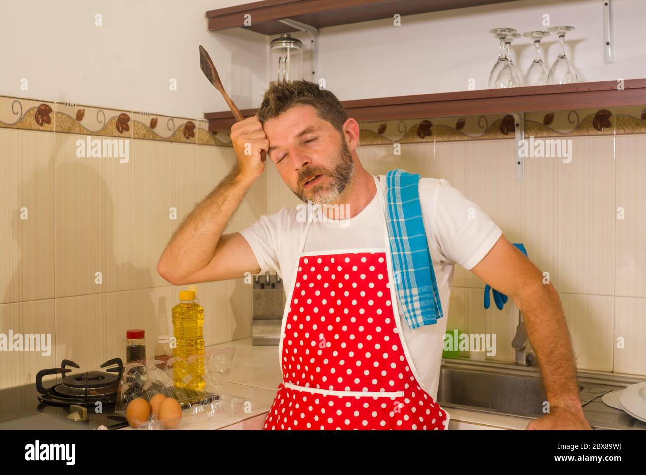 Exhausted chef in kitchen hi-res stock photography and images - Alamy