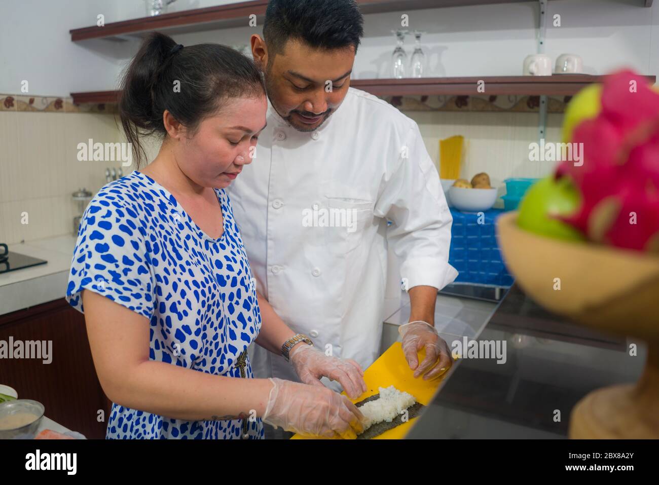 Couple making sushi hi-res stock photography and images - Alamy