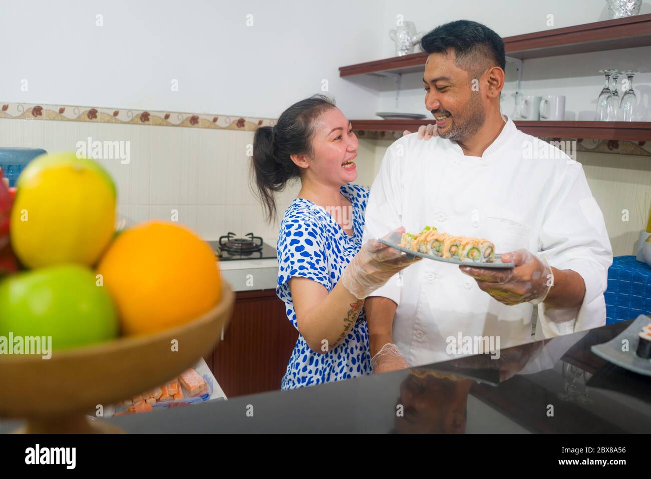 Couple making sushi hi-res stock photography and images - Alamy
