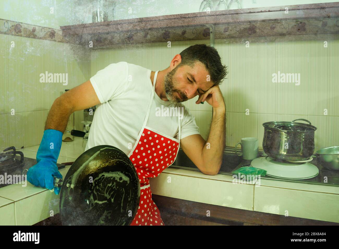 domestic chores stress - lifestyle portrait of young attractive ...