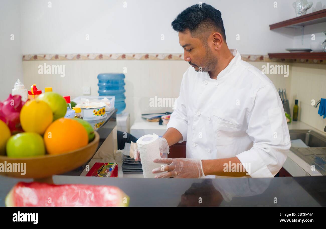 lifestyle portrait of Asian home cook man or professional chief ...