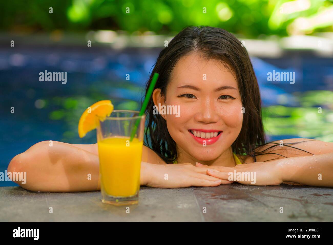Young Beautiful And Happy Asian Korean Woman In Bikini Enjoying Summer