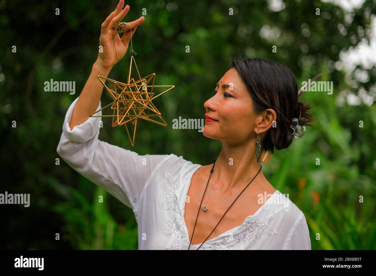 mind and body connection - beautiful and happy healer Asian woman ...