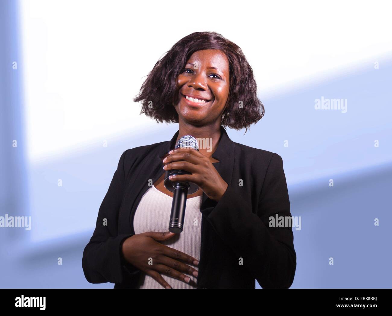 young attractive and confident black afro American business woman with ...