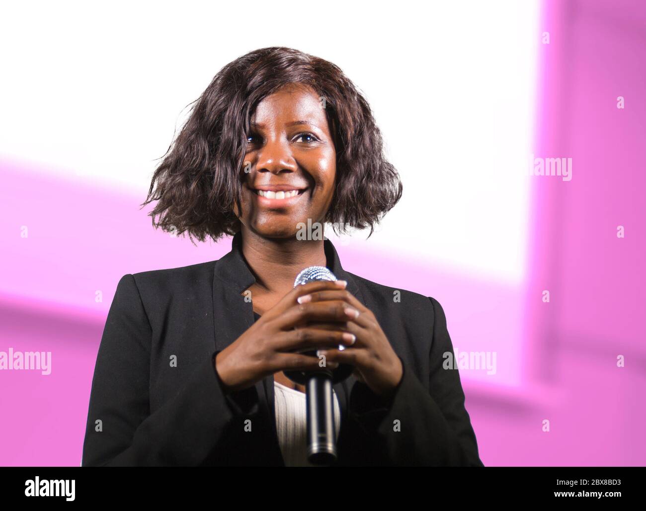 young attractive and confident black afro American business woman with ...