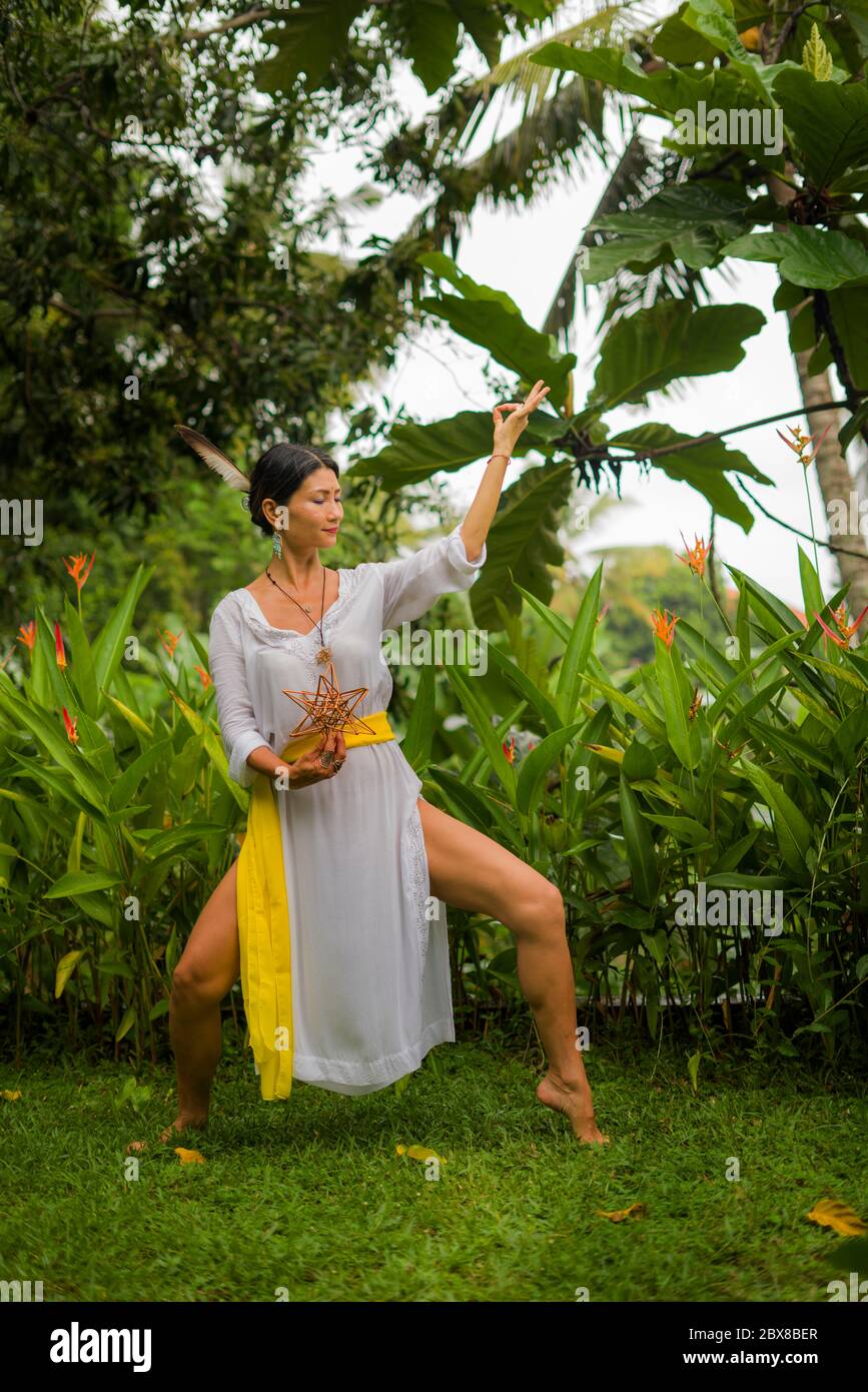 mind and body connection - beautiful and happy healer Asian woman ...