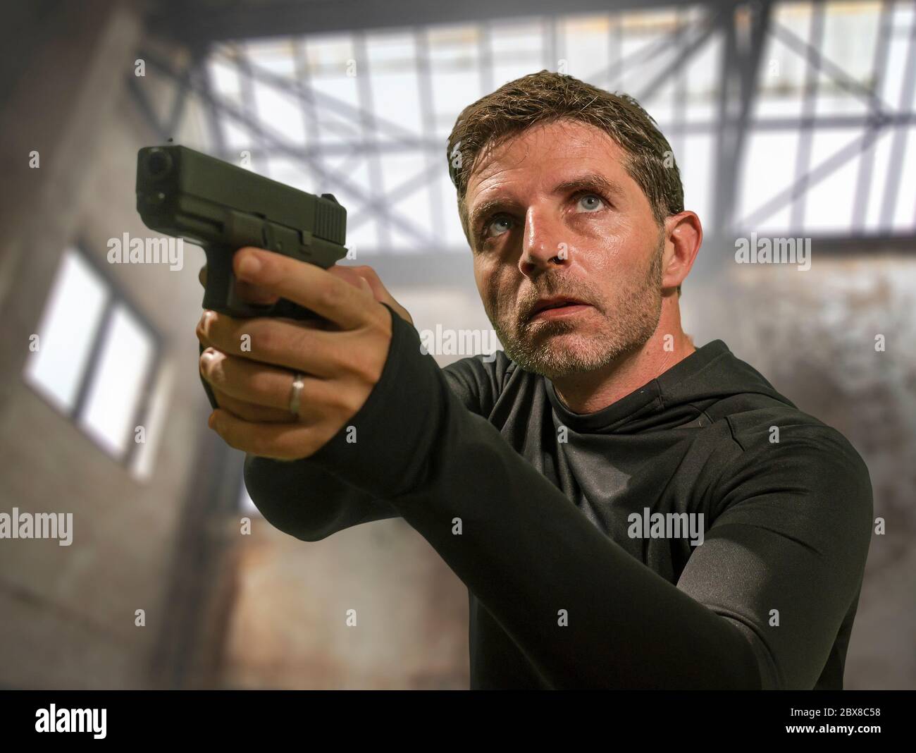 Aiming handgun hi-res stock photography and images - Alamy