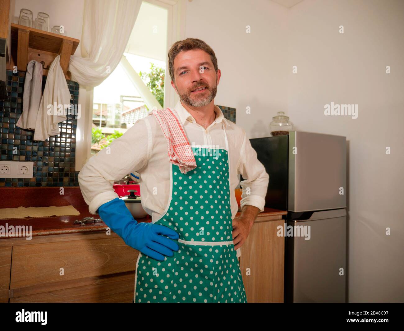 domestic chores lifestyle portrait of 30s to 40s happy and attractive ...