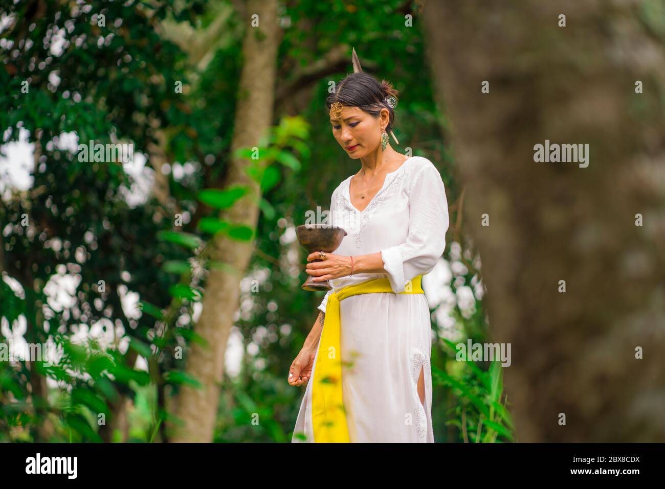 mind and body connection - beautiful and happy healer Asian woman ...