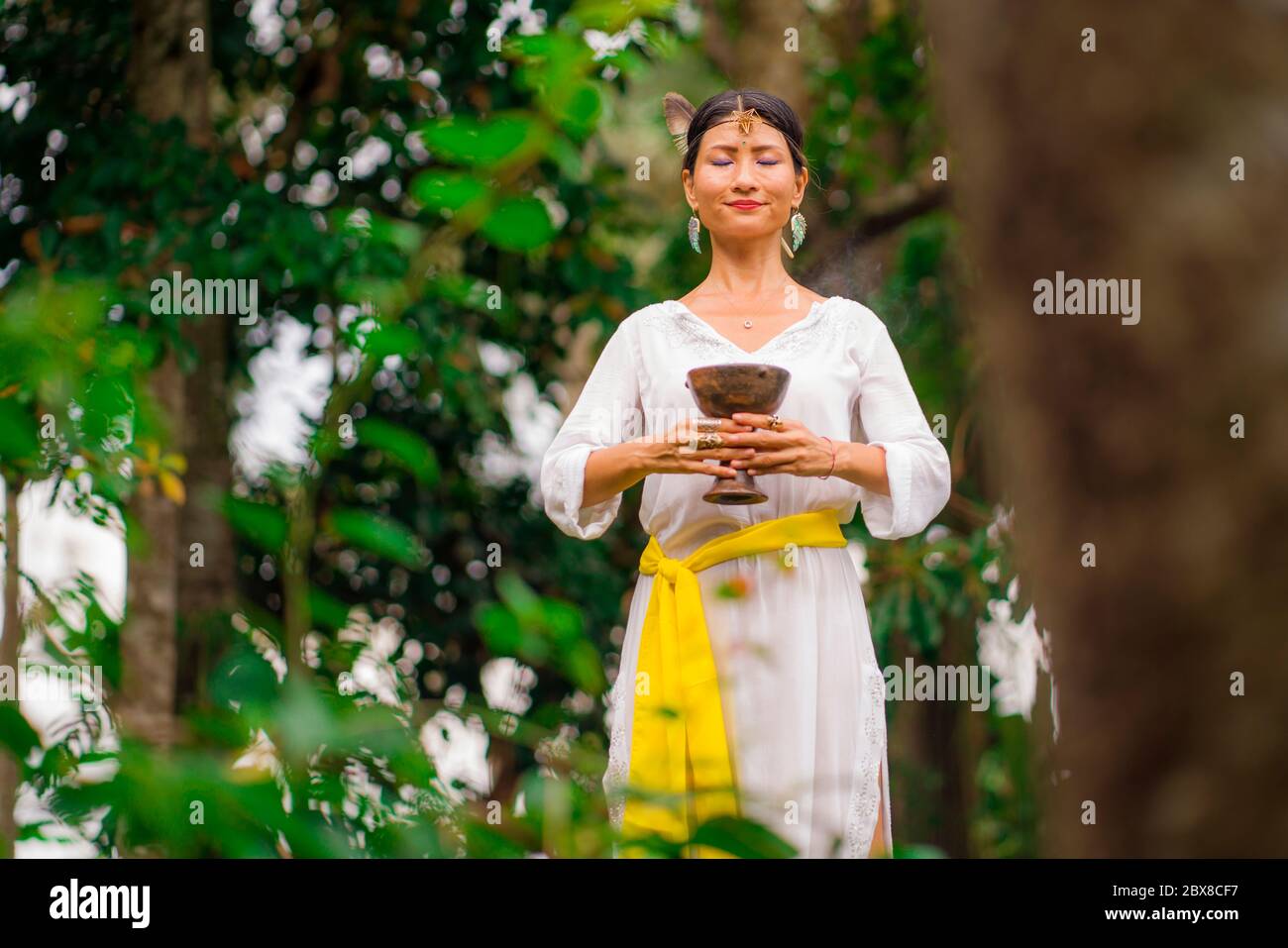 mind and body connection - beautiful and happy healer Asian woman ...