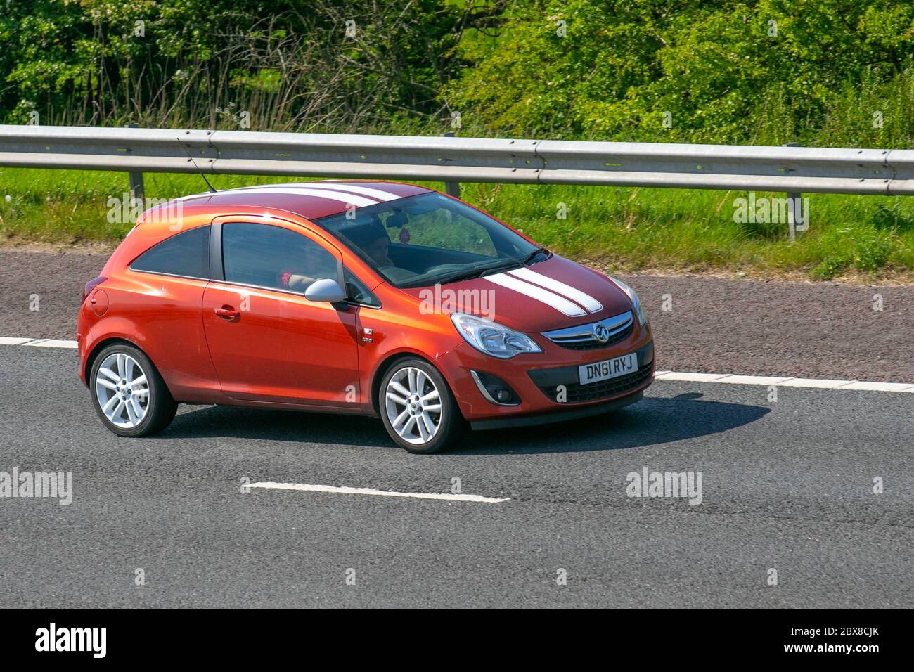 White car with orange stripes hi-res stock photography and images - Alamy