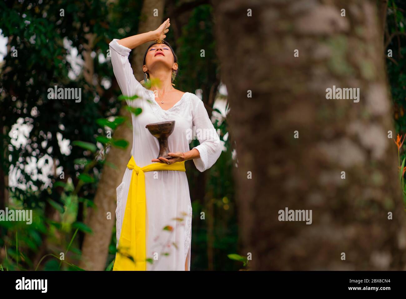mind and body connection - beautiful and happy healer Asian woman ...