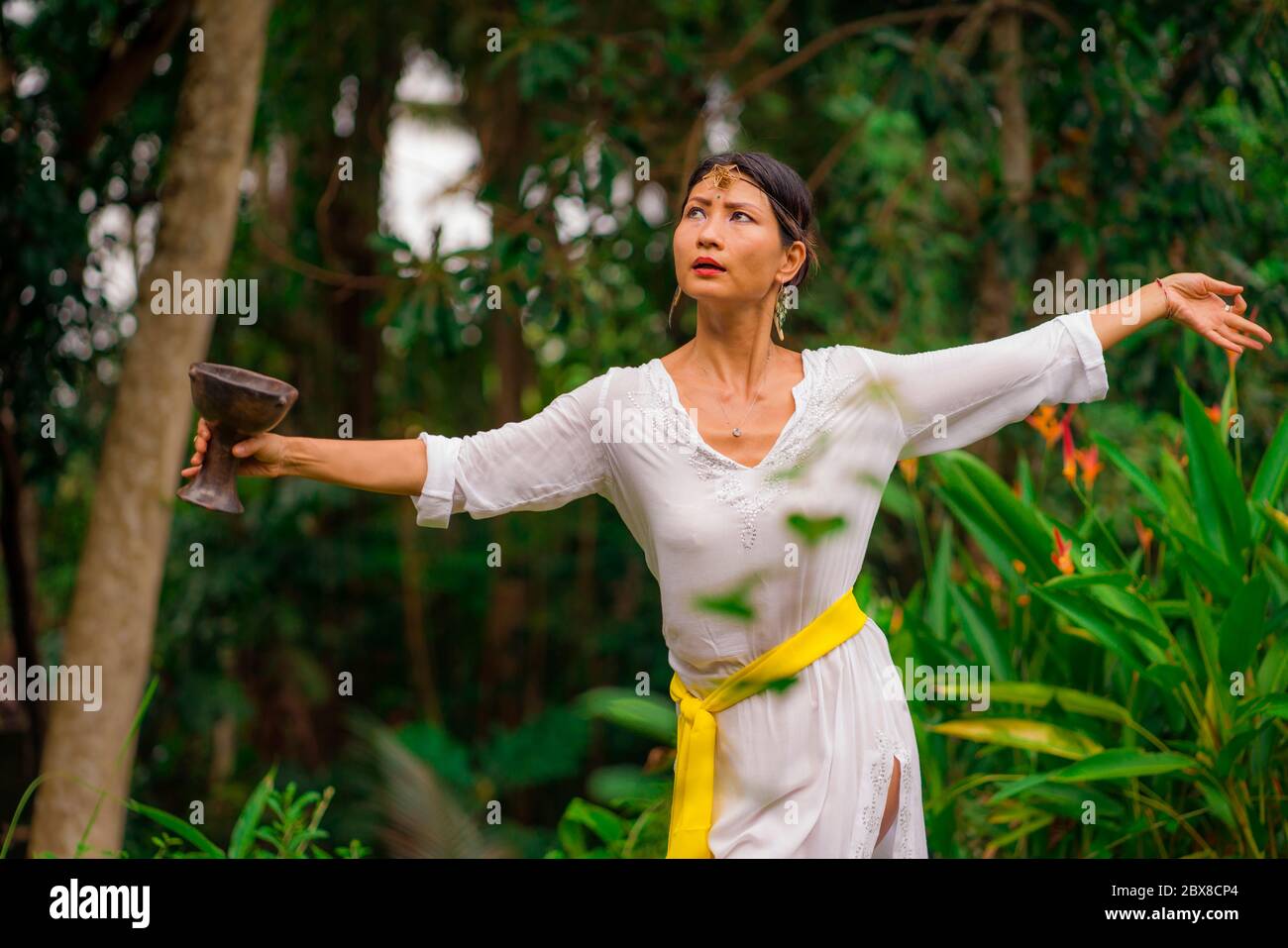 mind and body connection - beautiful and happy healer Asian woman ...