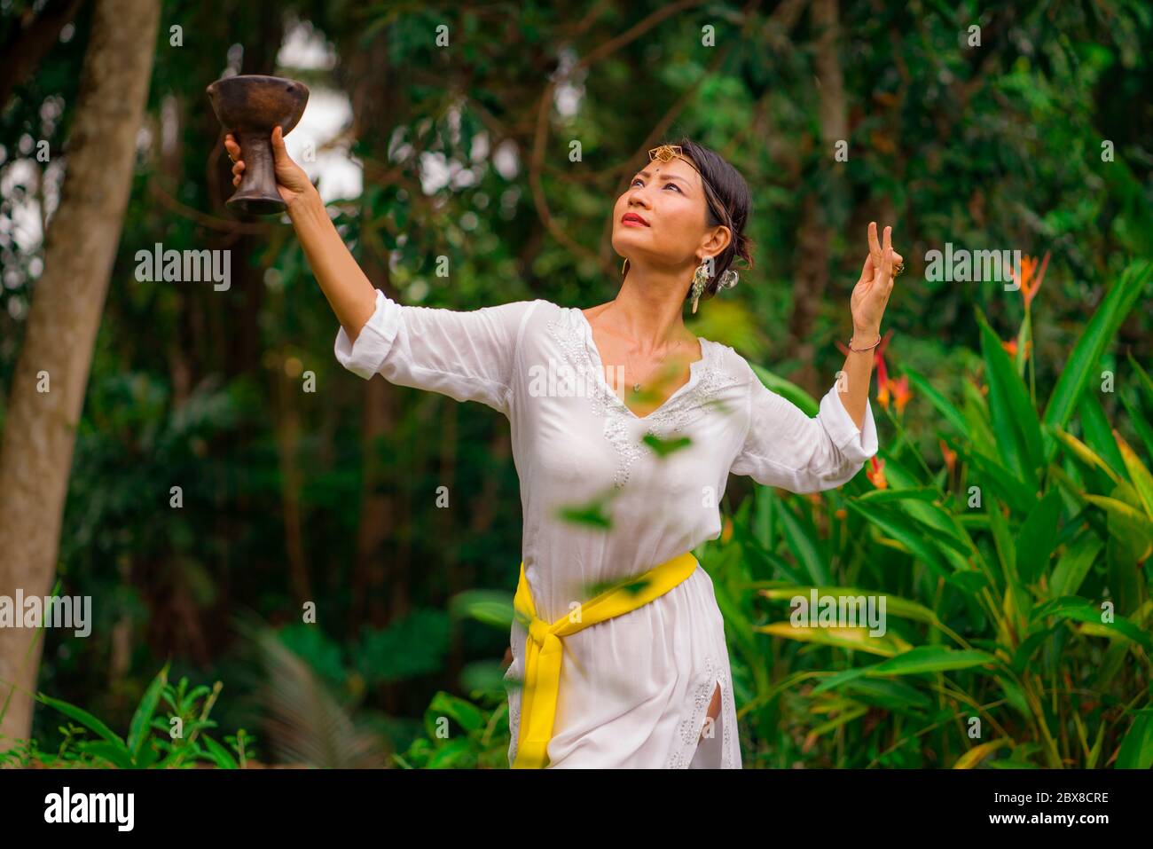 mind and body connection - beautiful and happy healer Asian woman ...