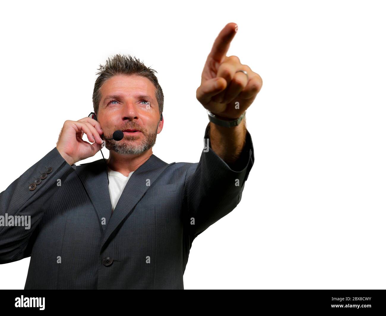 young attractive and confident successful man with headset speaking at ...