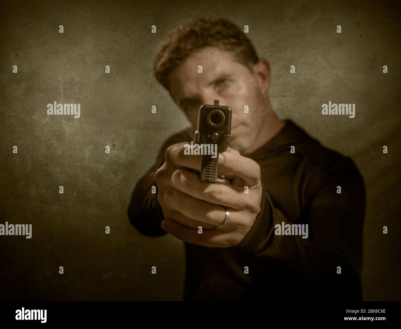 Male police officer pointing gun hi-res stock photography and images ...