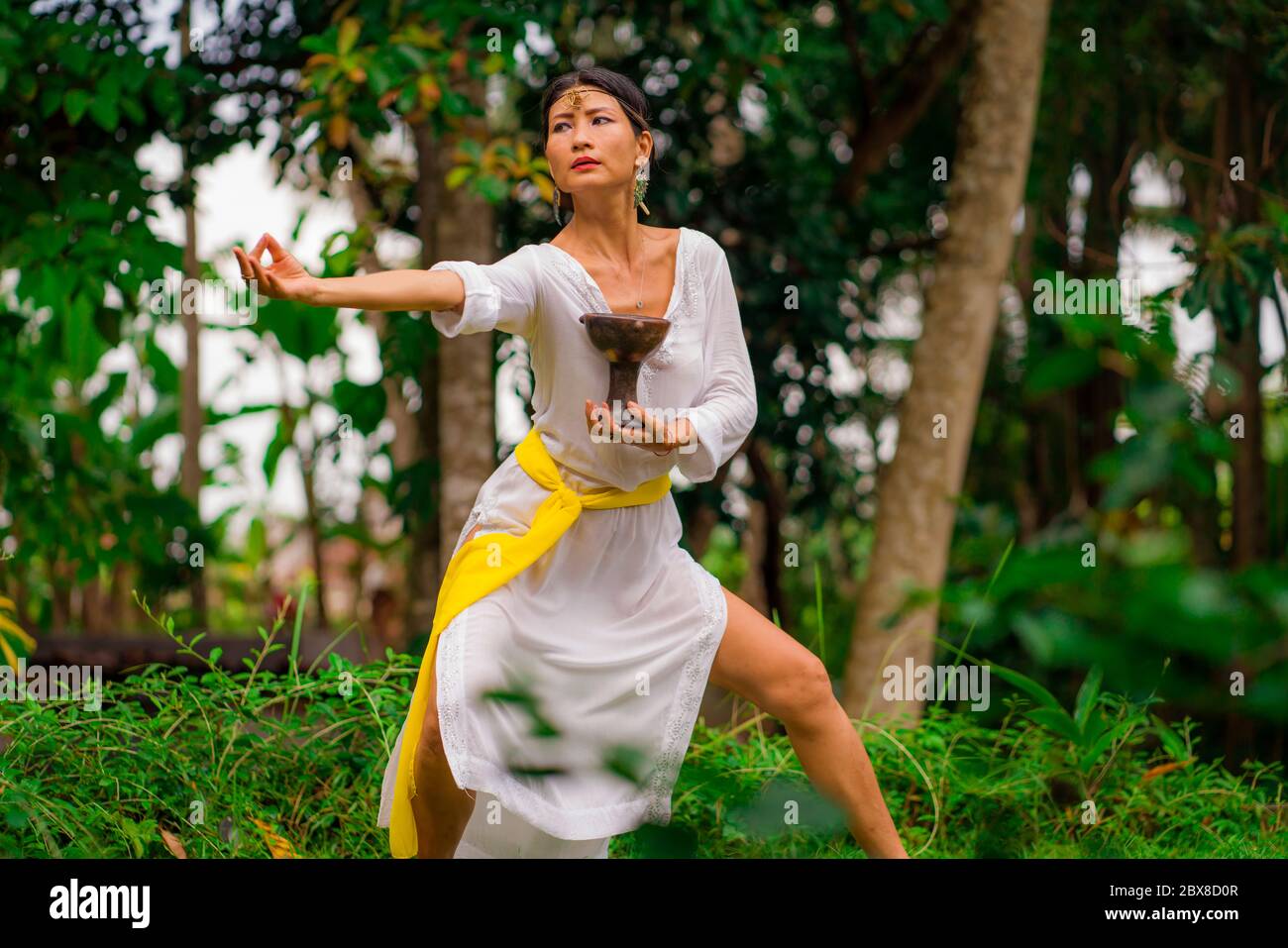 mind and body connection - beautiful and happy healer Asian woman ...