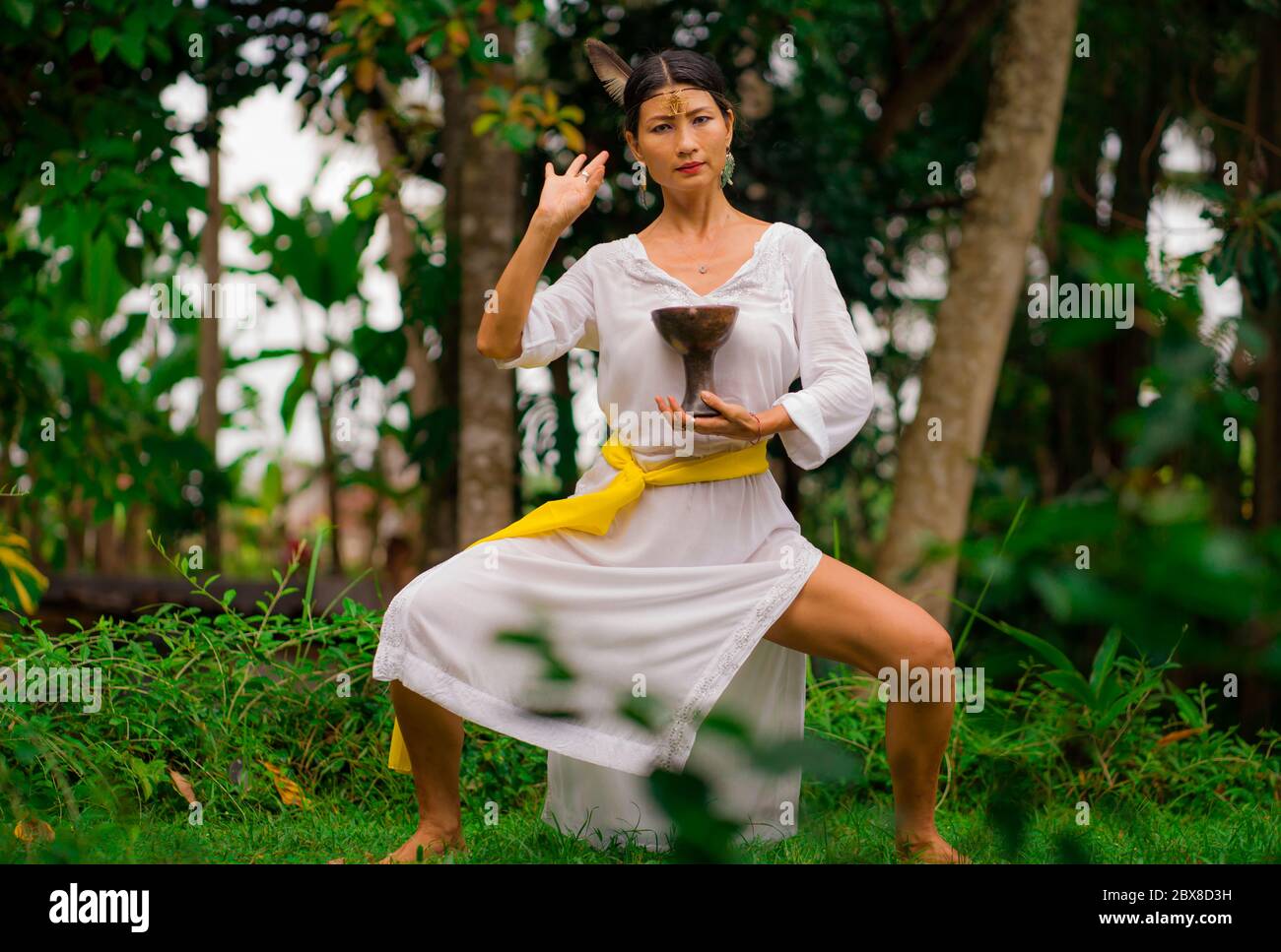 mind and body connection - beautiful and happy healer Asian woman ...