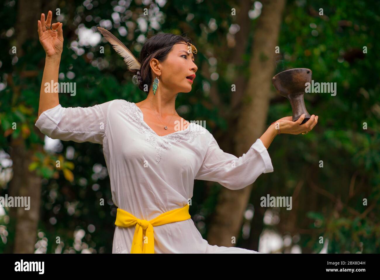 mind and body connection - beautiful and happy healer Asian woman ...