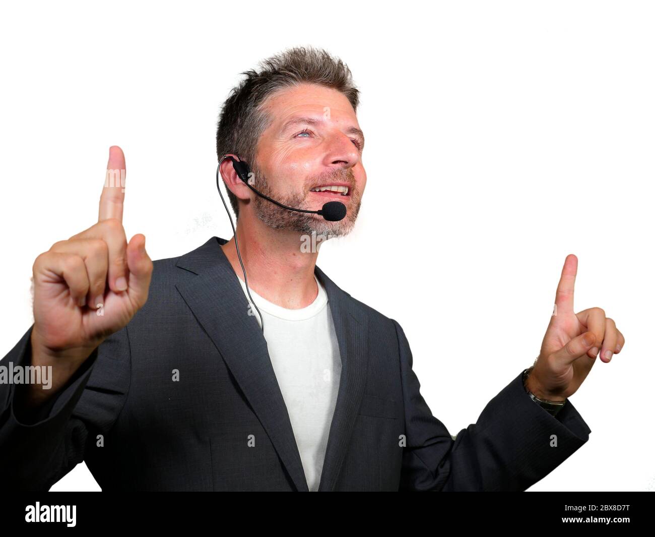 young attractive and confident successful man with headset speaking at ...