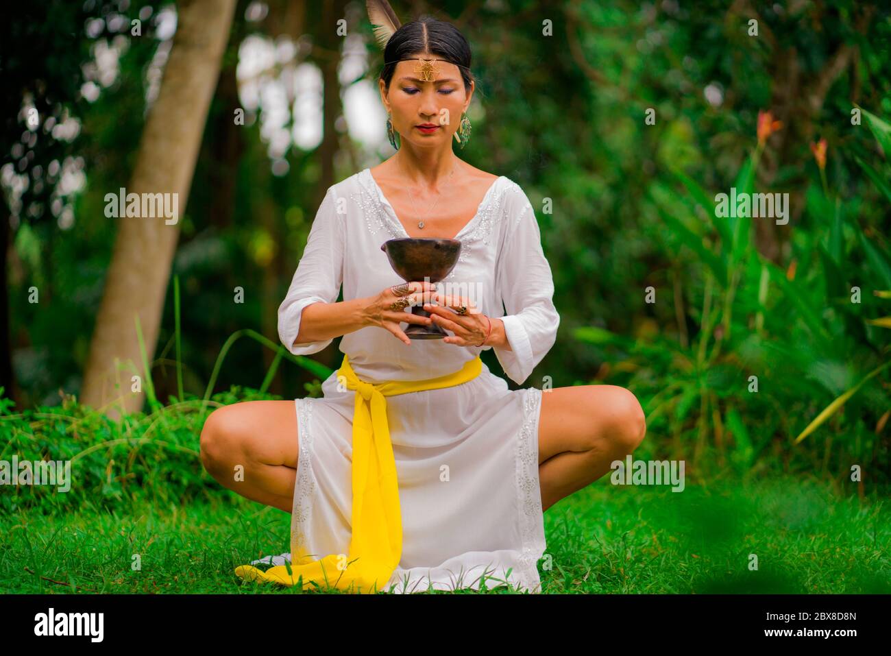 mind and body connection - beautiful and happy healer Asian woman ...