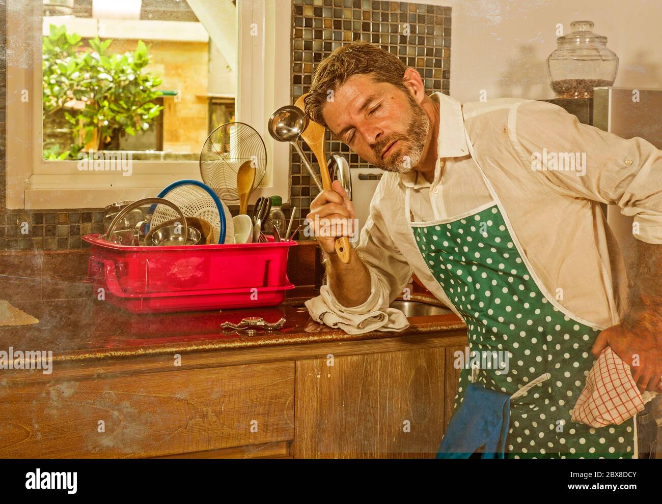 Portrait adult sad man cooking hi-res stock photography and images - Alamy