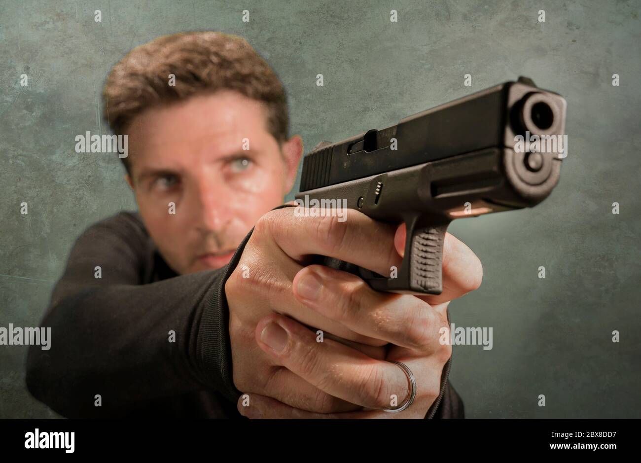 grunge cinematic portrait of attractive and dangerous looking hitman or ...