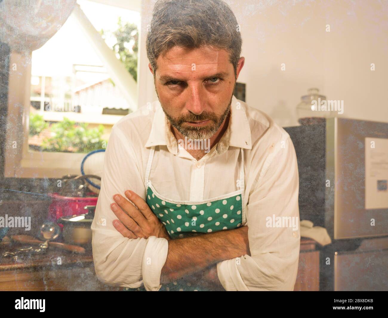 Portrait adult sad man cooking hi-res stock photography and images - Alamy