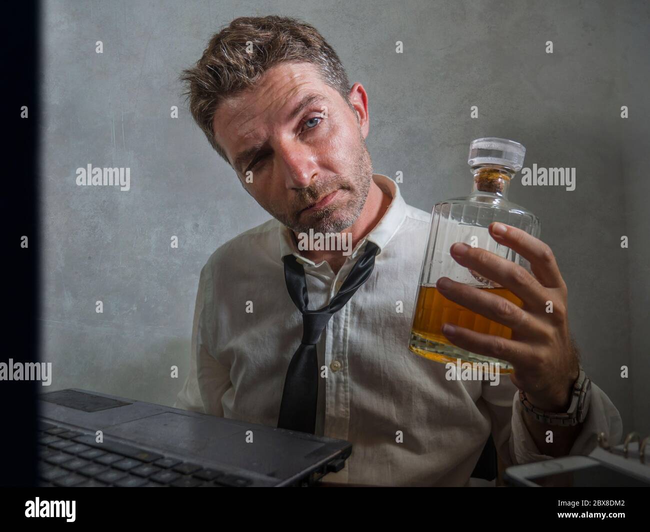 alcohol addict businessman - dramatic portrait of alcoholic man in lose ...