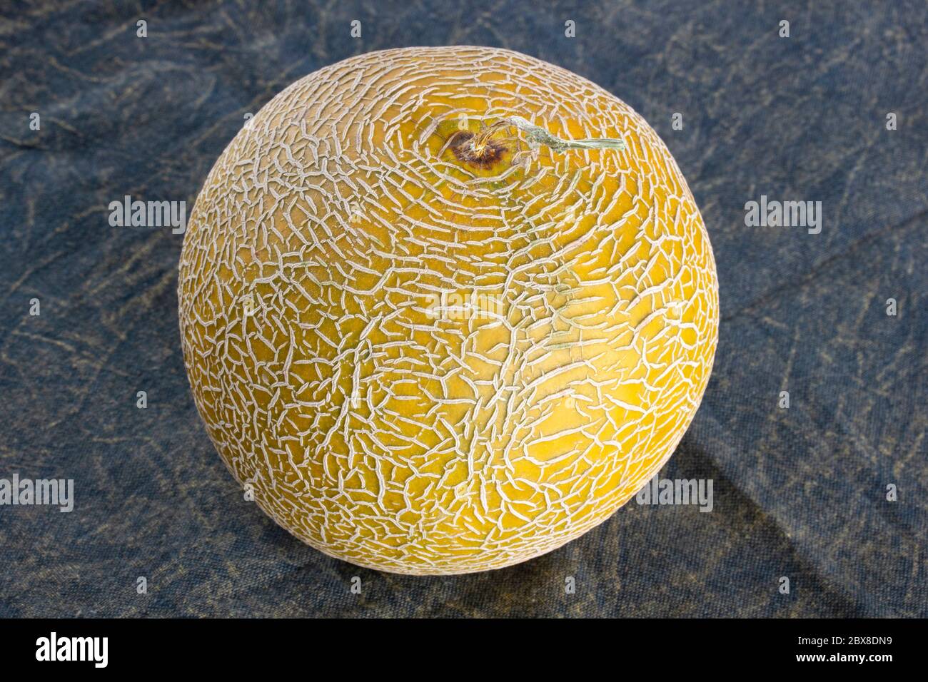 sweet and juicy whole melons Stock Photo - Alamy