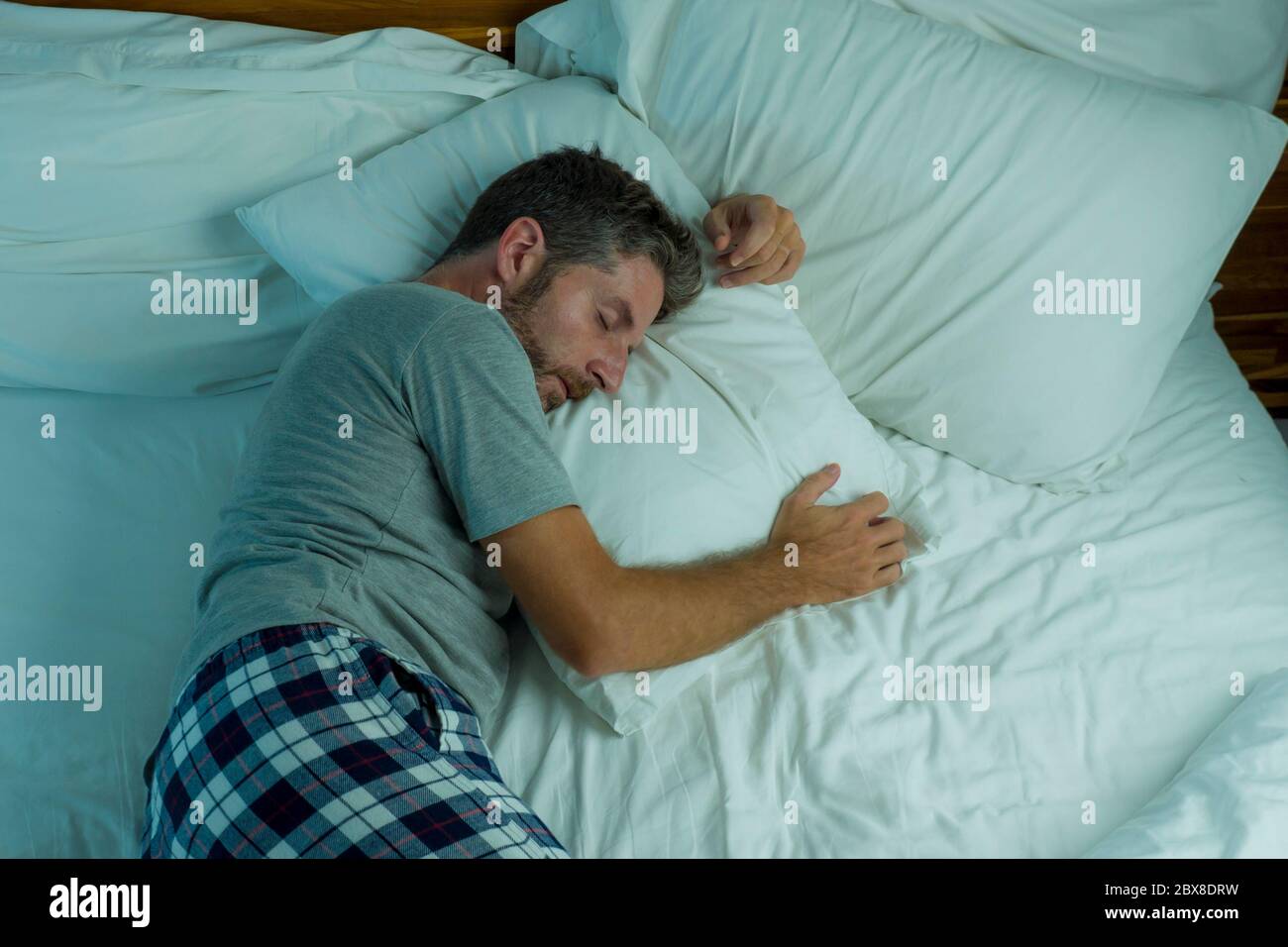 domestic lifestyle high angle portrait of young attractive and relaxed ...