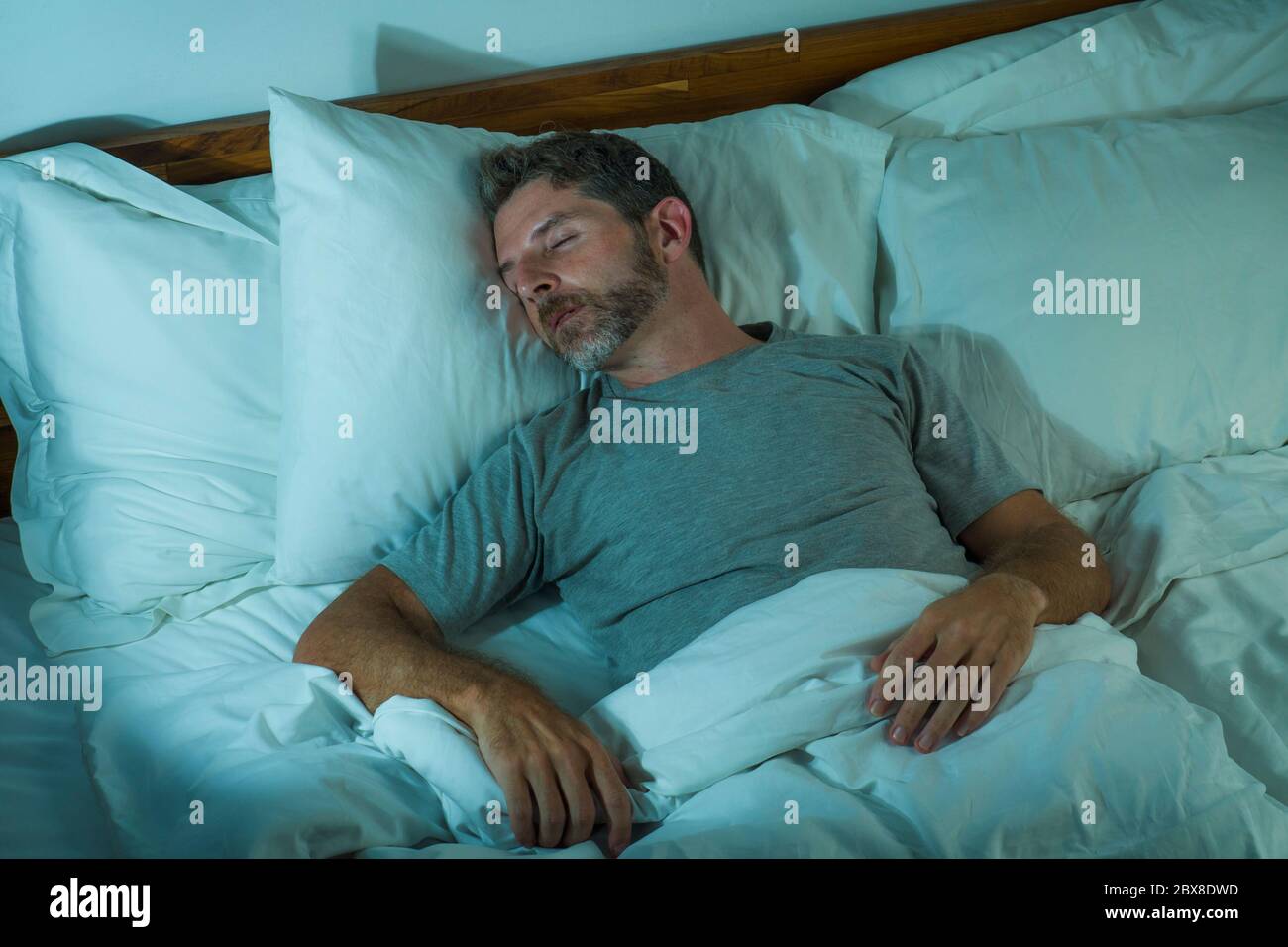 domestic lifestyle high angle portrait of young attractive and relaxed ...