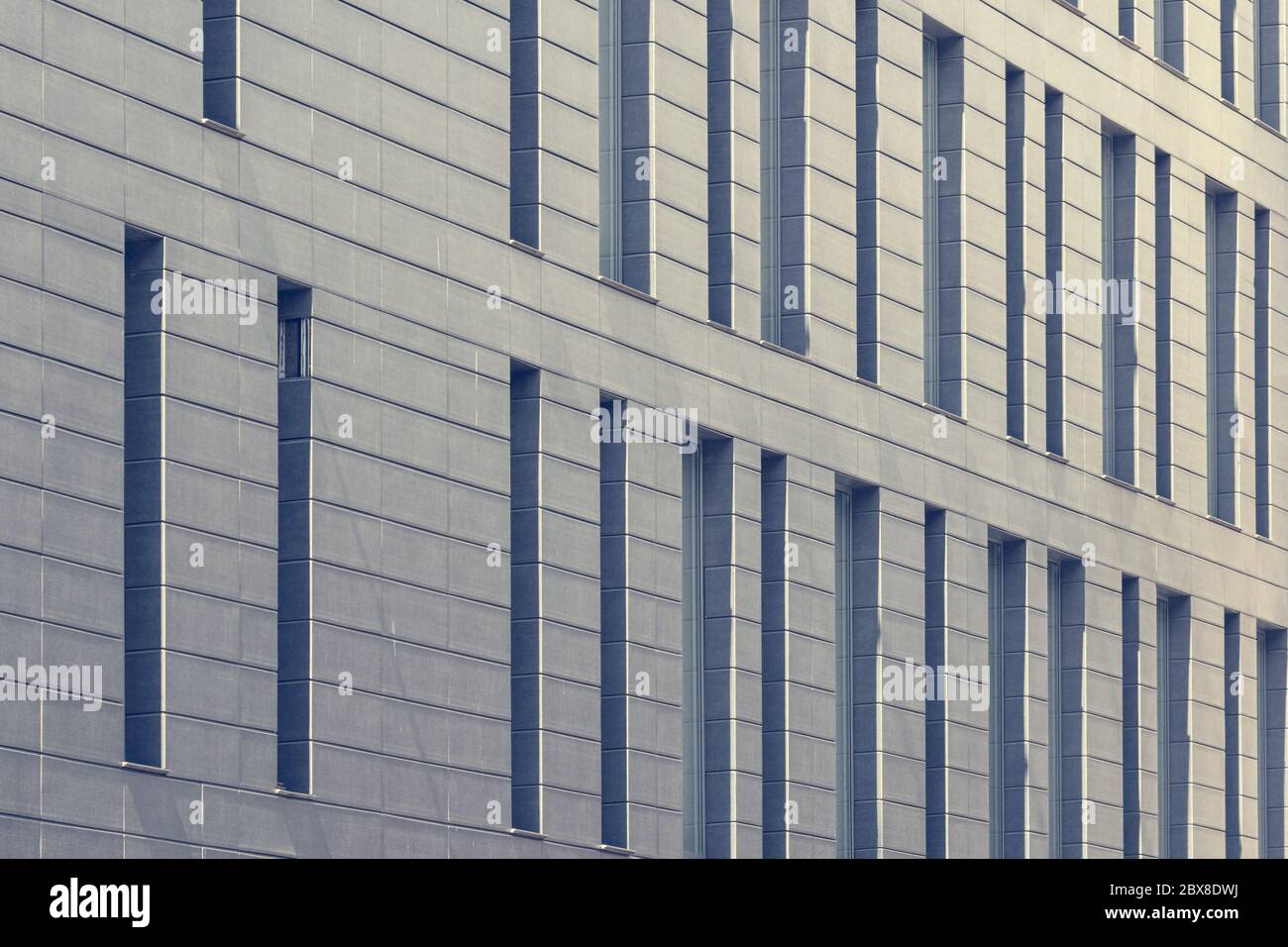 A fragment of the facade of one of the modern multi-storey residential ...